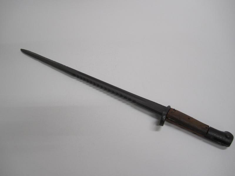 Hilted saw-edged bayonet and scabbard - Waikato Museum